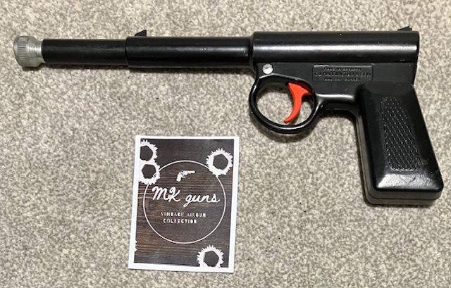 T J Harrington "The Gat" Black / Red Trigger Pop Out Pistol. - MK Guns