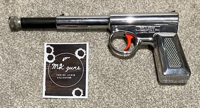 T J Harrington "The Gat" Chrome / Red Trigger Pop Out Pistol. - MK Guns