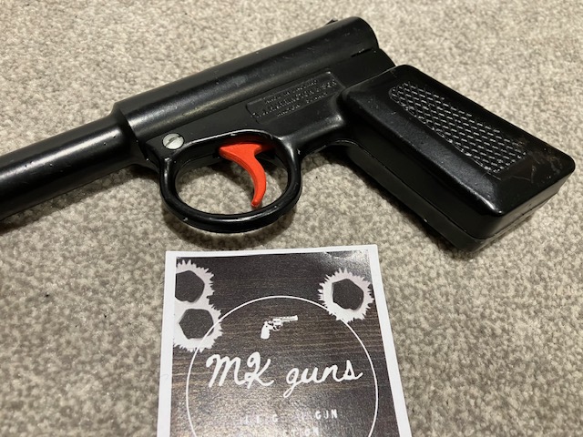 T J Harrington "The Gat" Black / Red Trigger Pop Out Pistol. - MK Guns