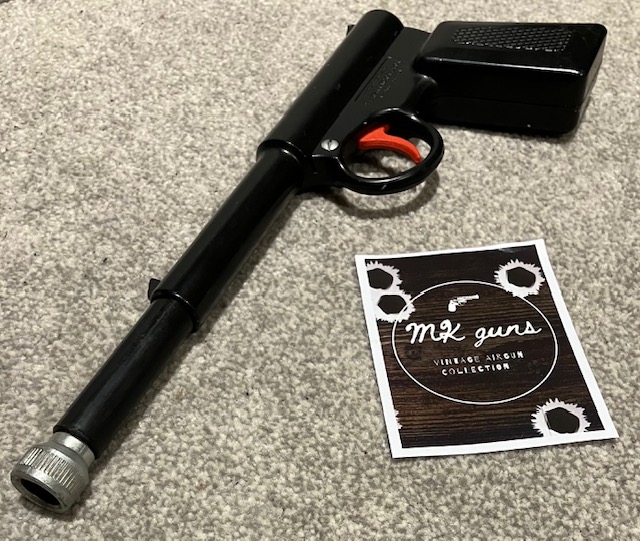 T J Harrington "The Gat" Black / Red Trigger Pop Out Pistol. - MK Guns