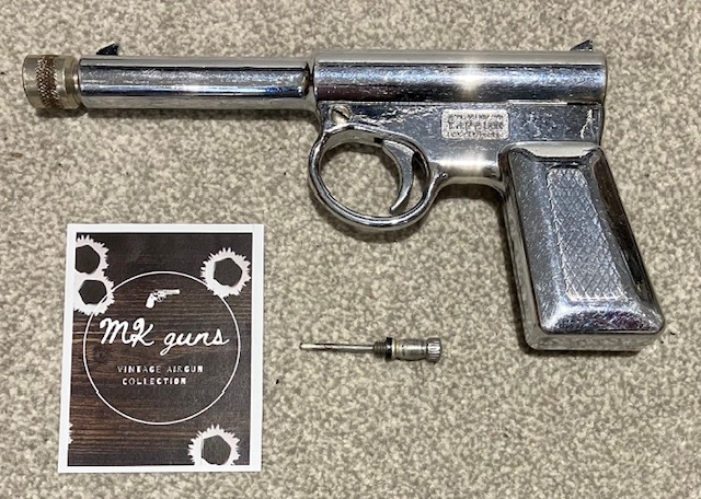 T J Harrington Chrome "The Gat Red Box" .177 Pop Out Pistol. - MK Guns